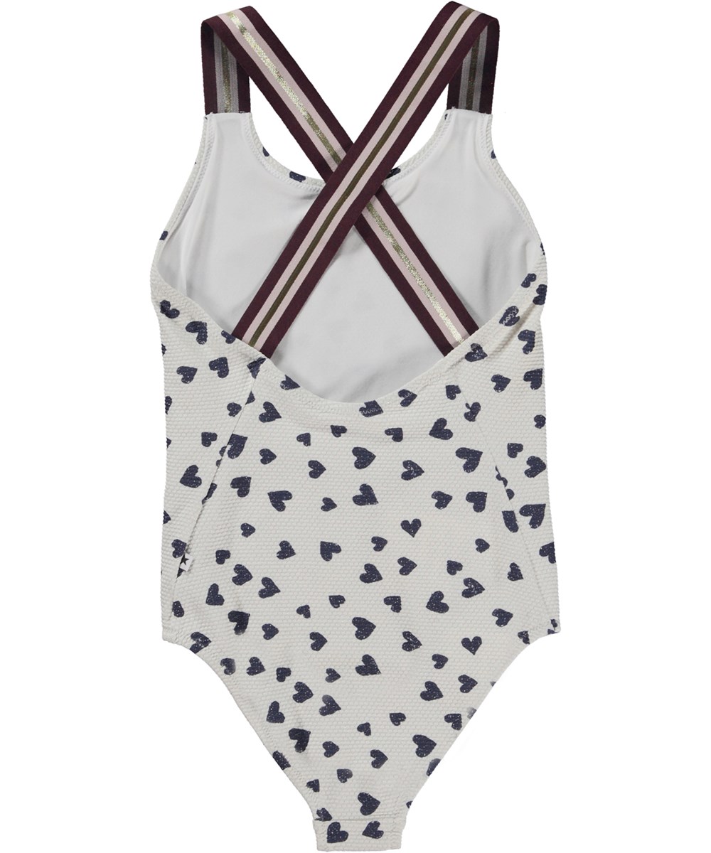 Neve - Blue Passion - Classic swimsuit in white with blue hearts - Molo